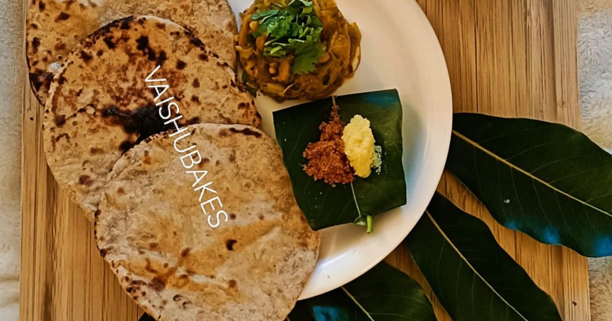 Maharashtrian Lunch Thali Of Bhakri, Vangyache Bharit, Phodniche Varan ...