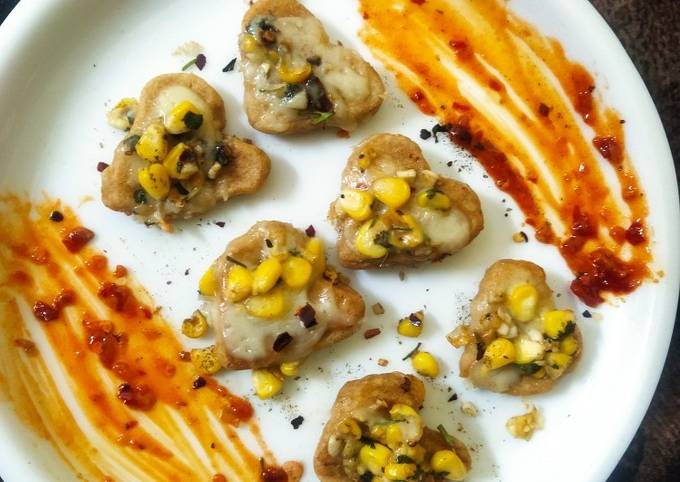 Cheesy corn garlic bread Recipe by Uma Malpani - Cookpad