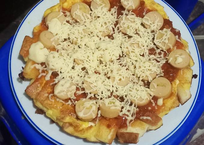 Resep Pizza Roti Tawar oleh Uli (Mama Shaka Syva) - Cookpad