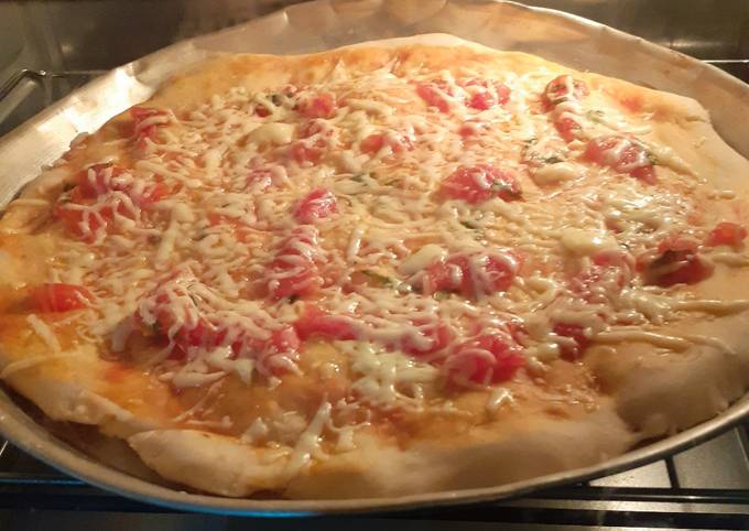 Pizza con Queso Sardo Rallado Receta de Cielo - Cookpad