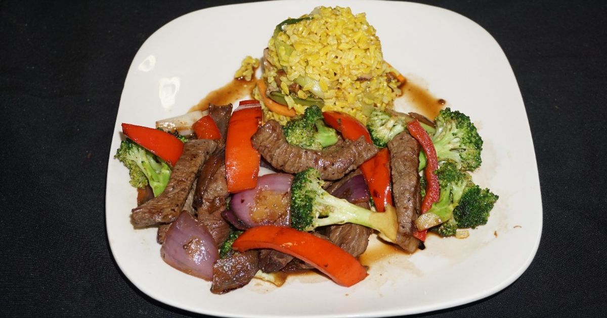 Lomo Saltado With Broccoli And Red Bell Pepper Recipe by Jon Michelena