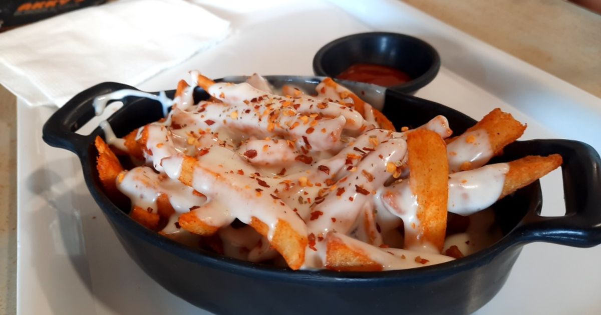 Cheesy Peri Peri Fries 🍟 Recipe by Dolly Kachhwani - Cookpad