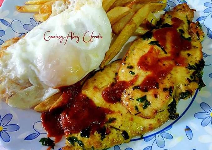 Filetes de pechuga de pollo medianos en especial, ajo y perejil Receta ...