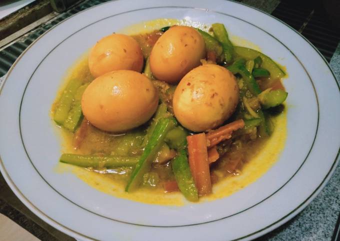 Resep Telur Acar Kuning oleh Citramel89 - Cookpad