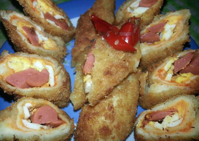 Resep Roti tawar isi sosis telur oleh Nurliana - Cookpad