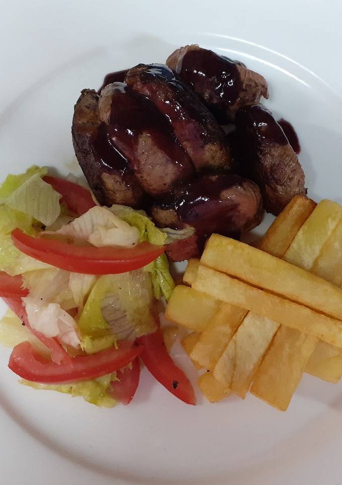 Medium-well done steak having red sauce, French fries and salad Recipe ...