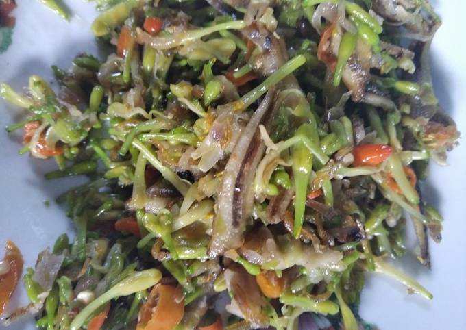 Resep Tumis bunga pepaya+teri tidak pahit oleh Tri Wahyuningsih - Cookpad