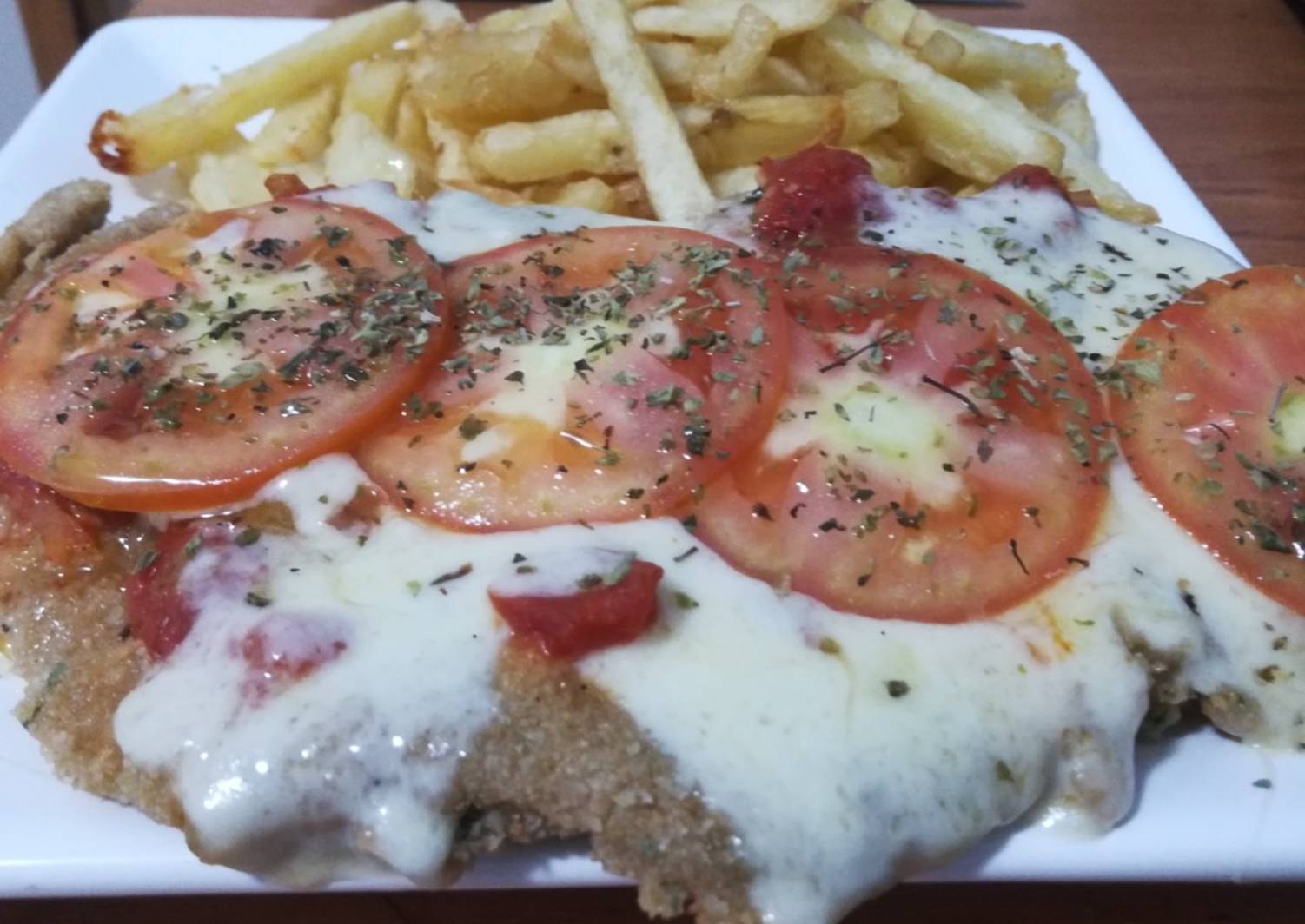 Milanesa a la Napolitana con papas fritas Receta de Cocinemos Juntos- Cookpad