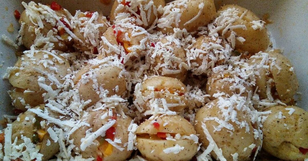 Baked Potatoes With Stuffings And Grated Feta Cheese Recipe by ...