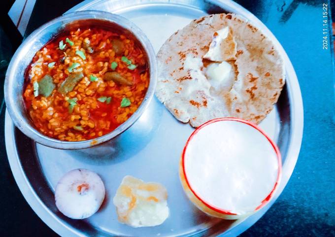 Healthy tasty fiber rich moongdal and turai sabji and millet flour roti ...