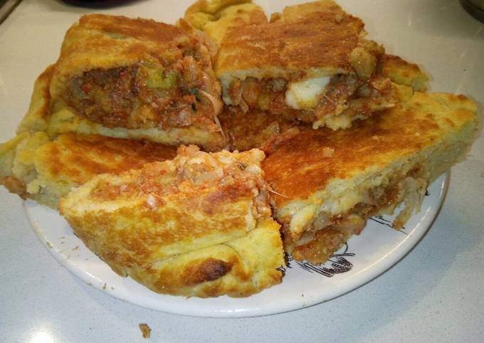 Ricetta L'impanata con broccoli salsiccia e mozzarella Siciliana di ...